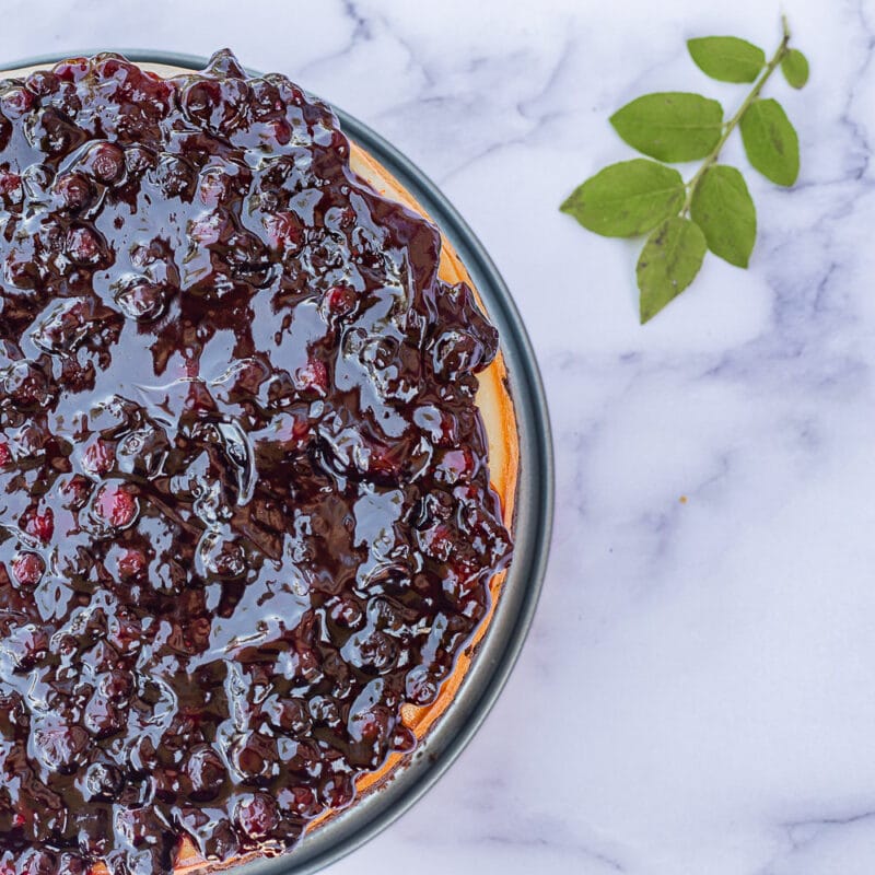 Huckleberry Cheesecake with a Brownie Crust | Hilda's Kitchen Blog